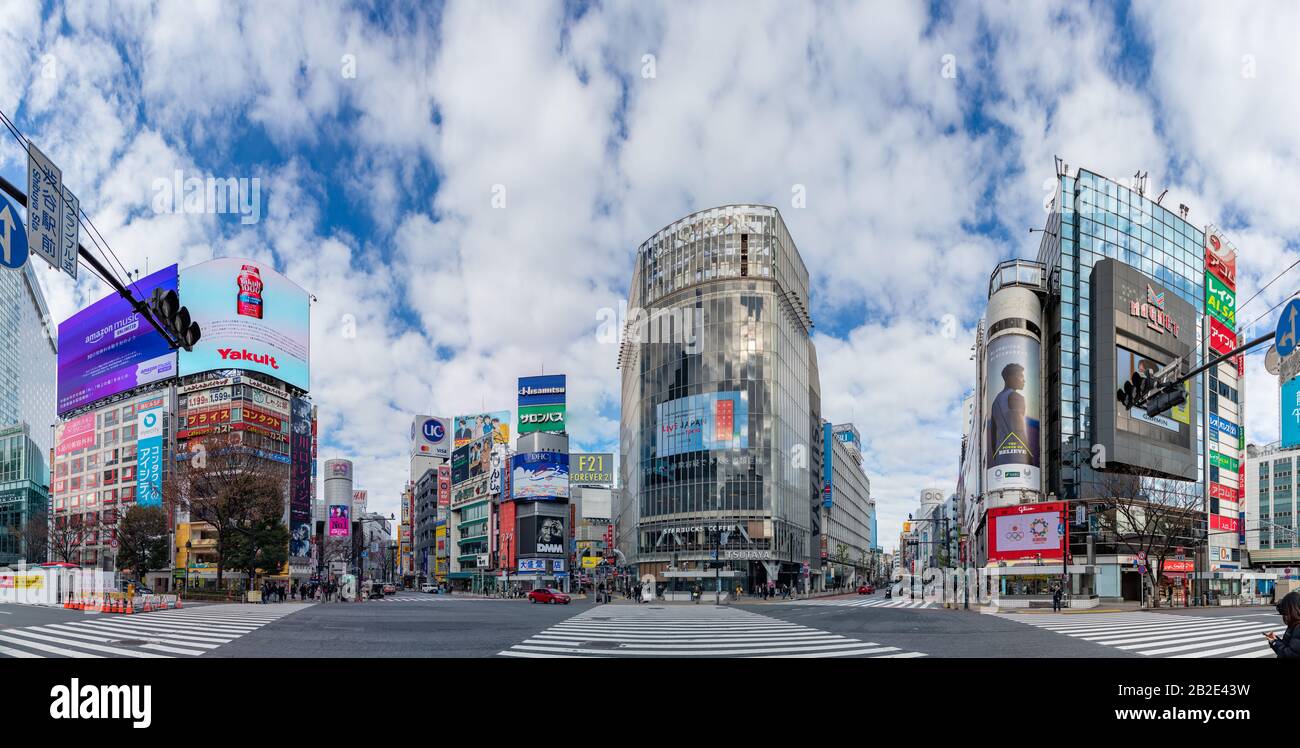 A panorama picture of the Shibuya Crossing, taken from the street level ...