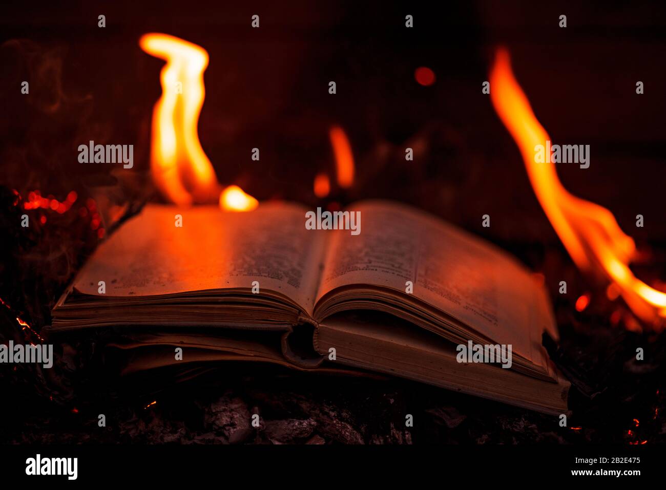 Background from burning books.Burning pages of books. Books on fire ...