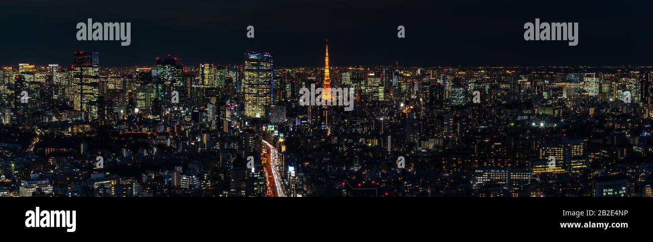 A panorama picture of the Tokyo cityscape, showing the Tokyo Tower, at ...