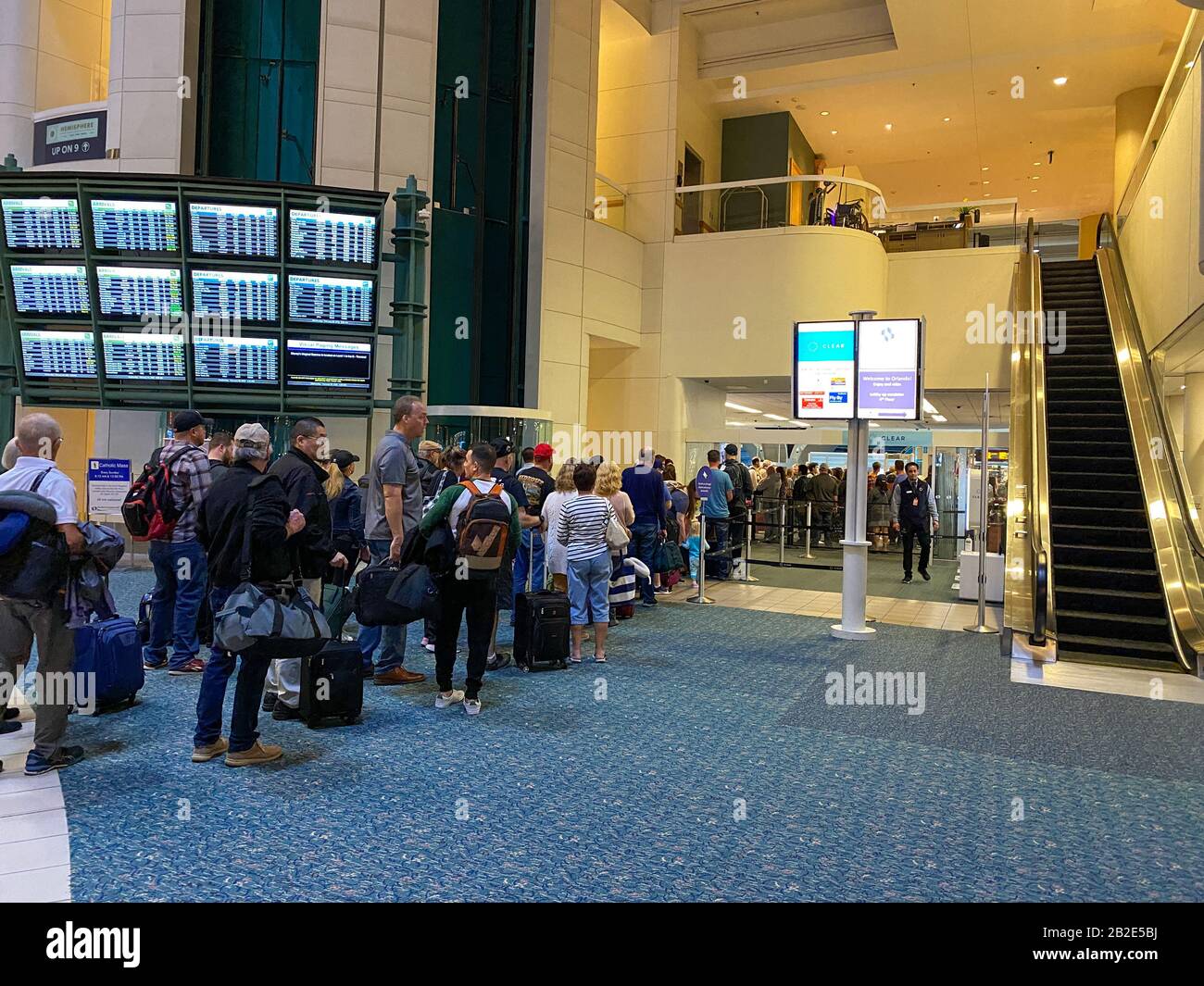 Orlando,FL/USA-2/27/20: People waiting in line to go through Orlando ...