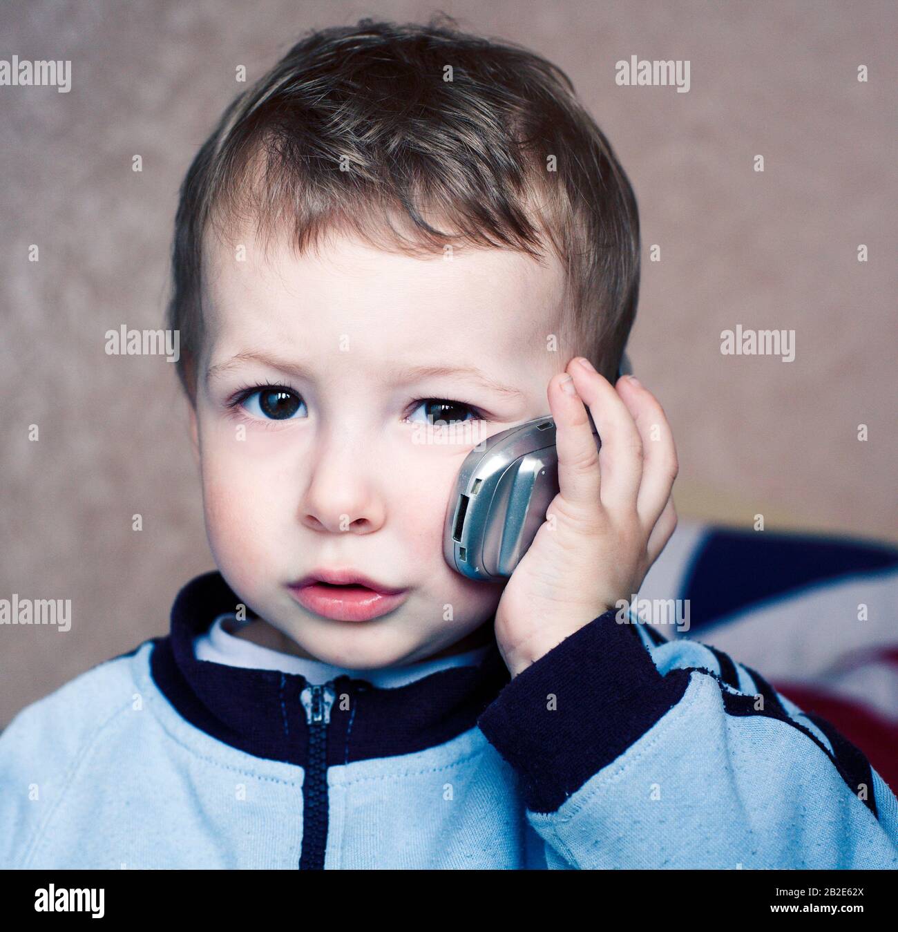 little cute boy talking on phone, lifestyle people concept Stock Photo ...
