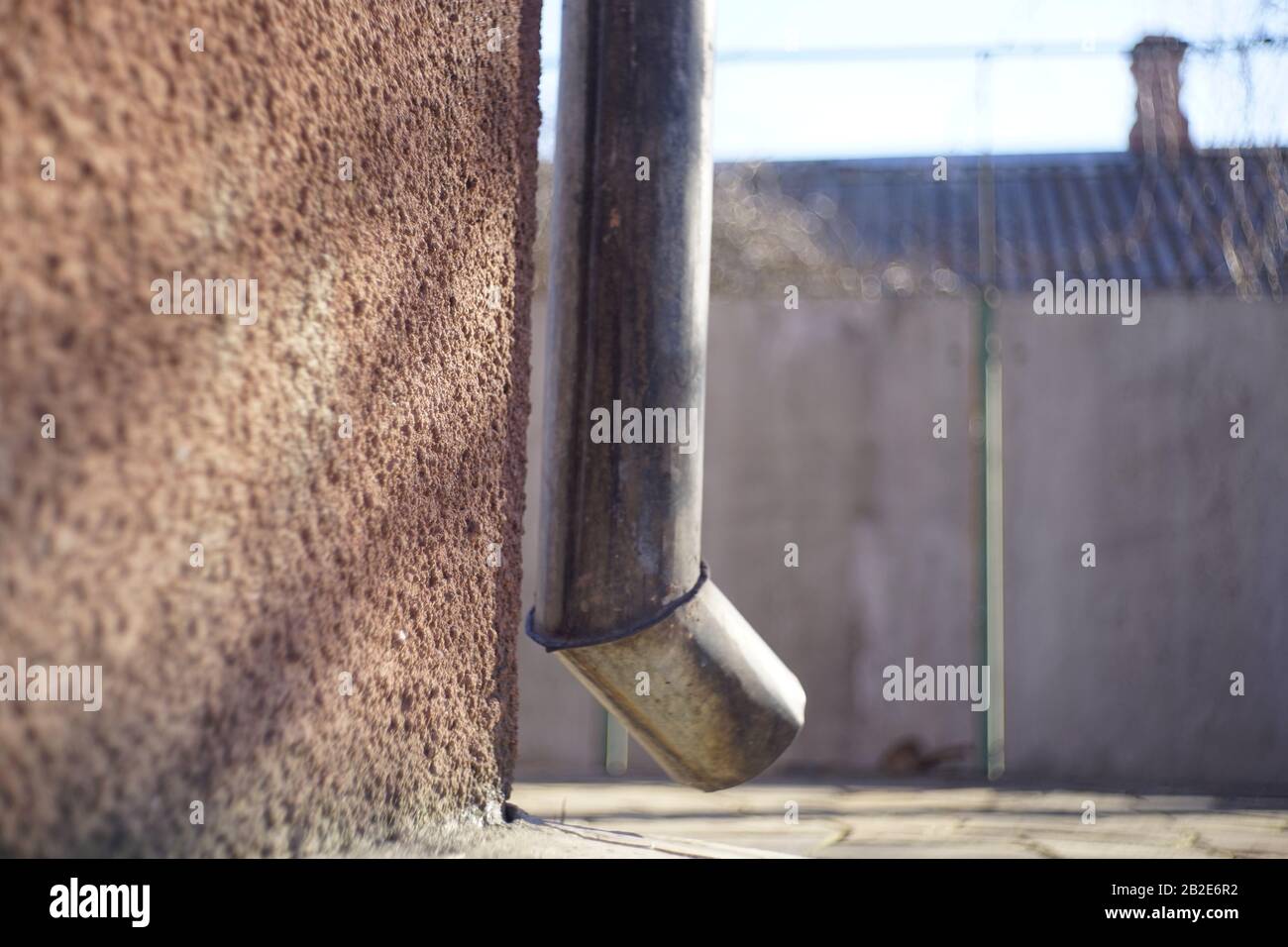 Old drain pipe at the corner of the rural house Stock Photo - Alamy