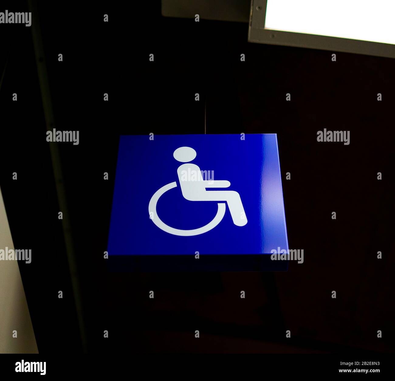 Blue sign of the handicapped. Concept of the disabled and wheelchair ...