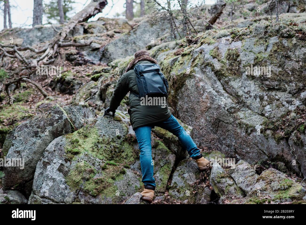 Man climbing a hi-res stock photography and images - Alamy