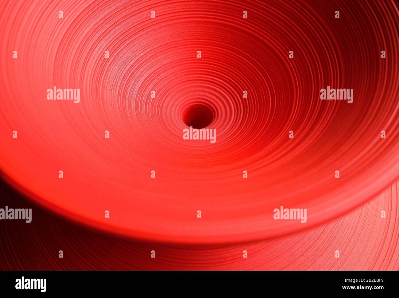 Bright red wrap plastic texture as background Stock Photo - Alamy