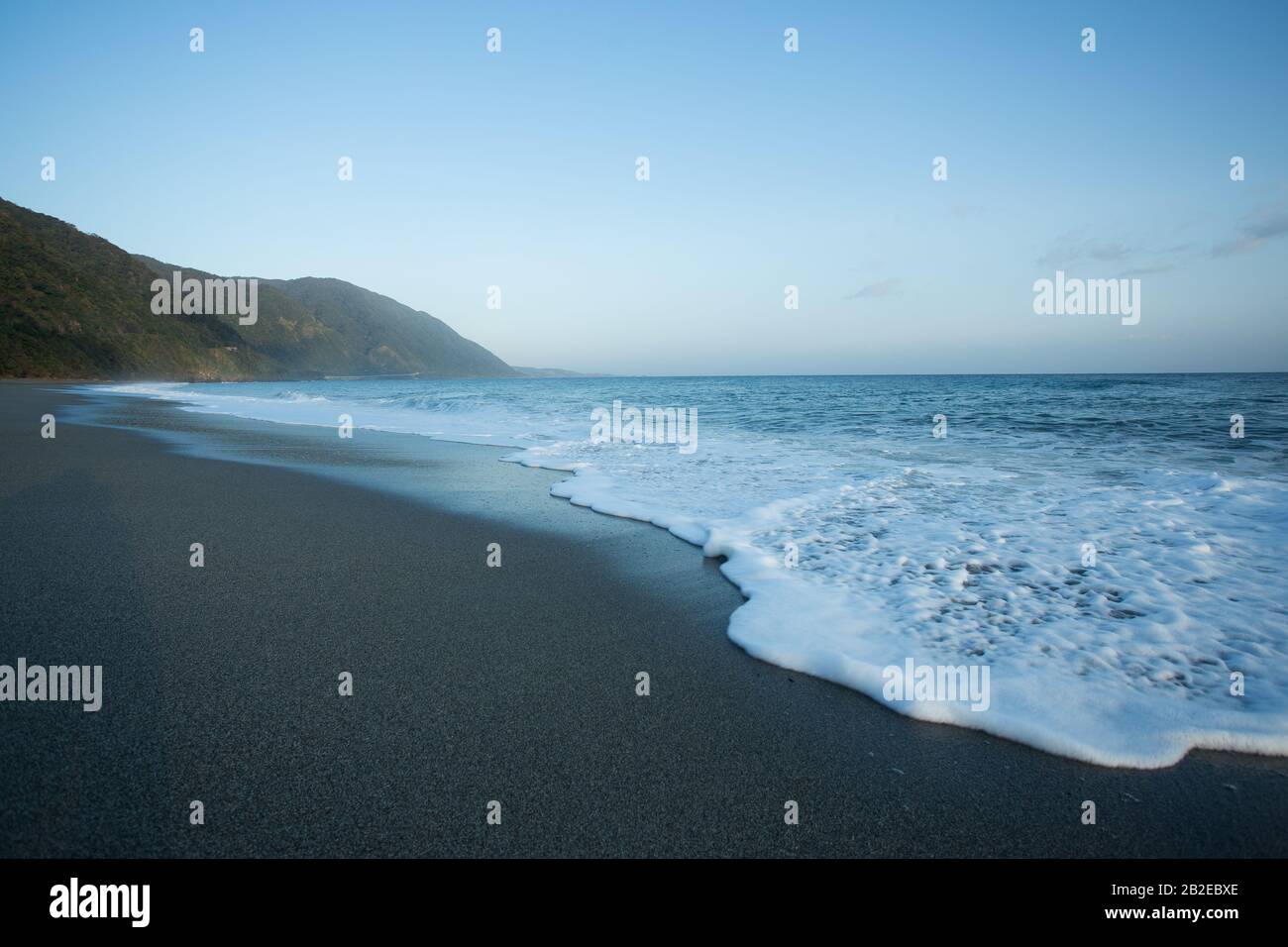 Peaceful sunrise on a beach in the Philippines Stock Photo - Alamy