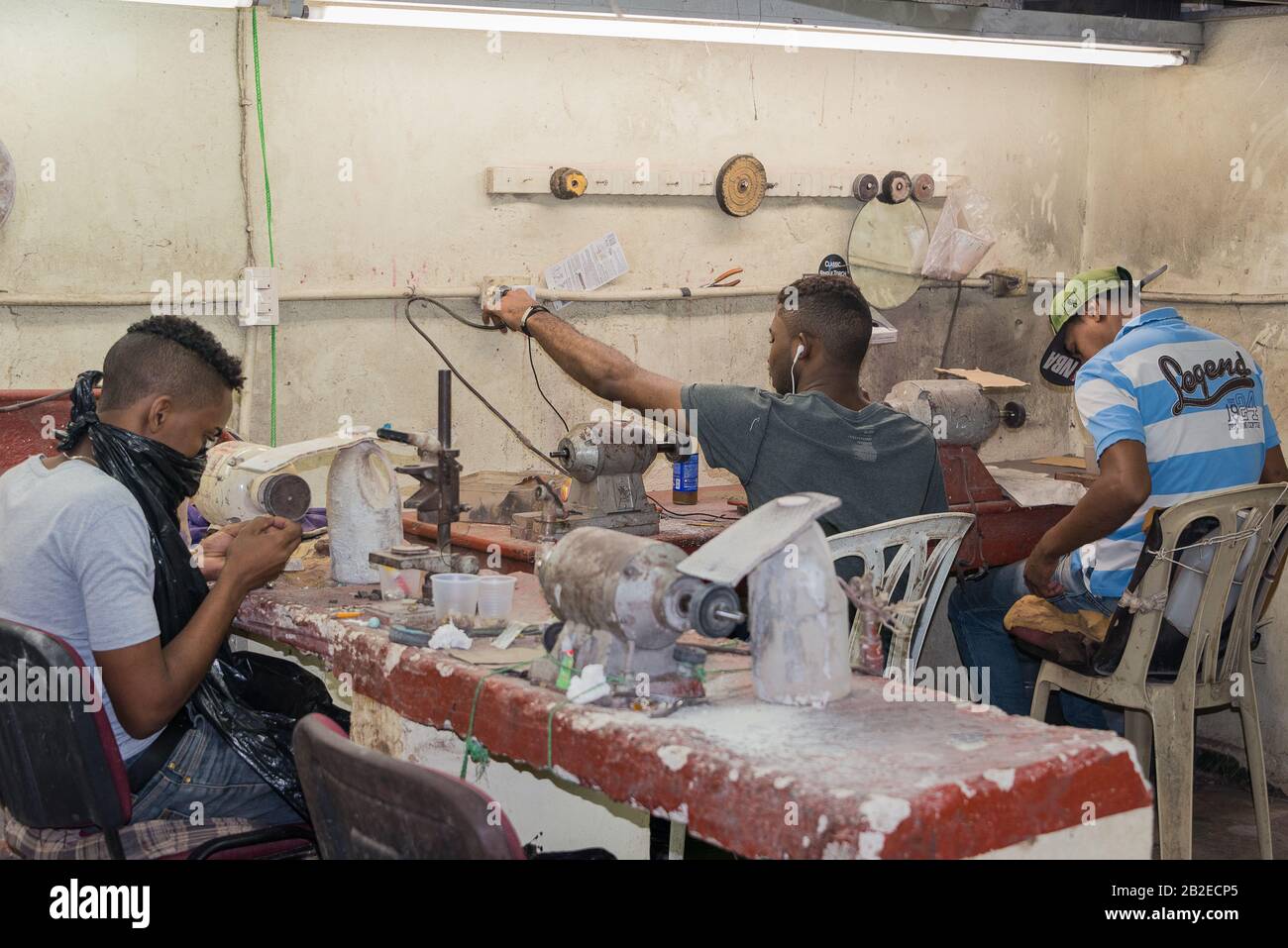 Factory workers in Santo Domingo Stock Photo - Alamy
