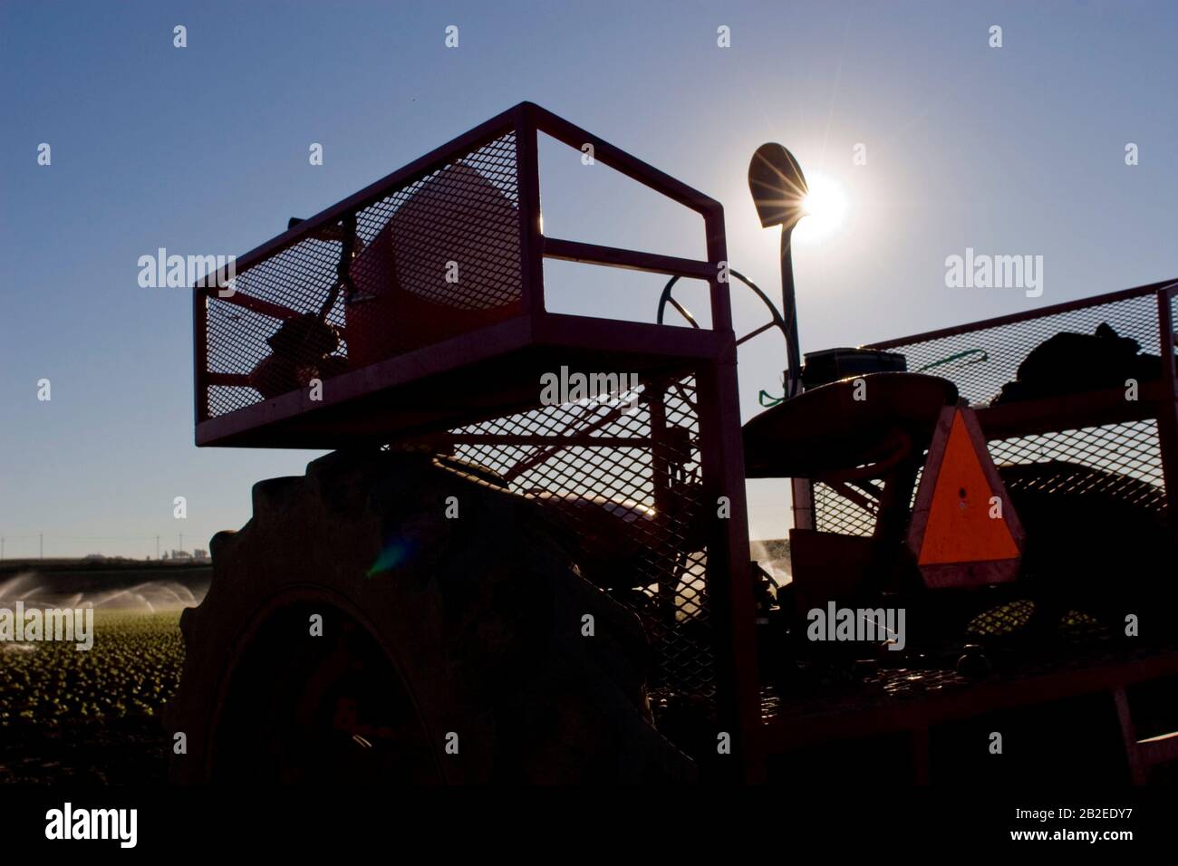 Hand use farming supplies n rack on tractor Stock Photo - Alamy