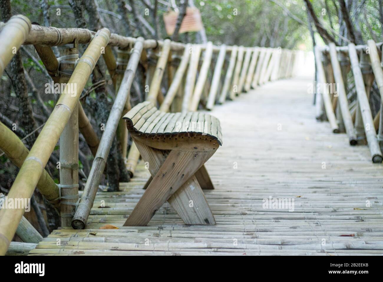 native chair in a walkway Stock Photo - Alamy