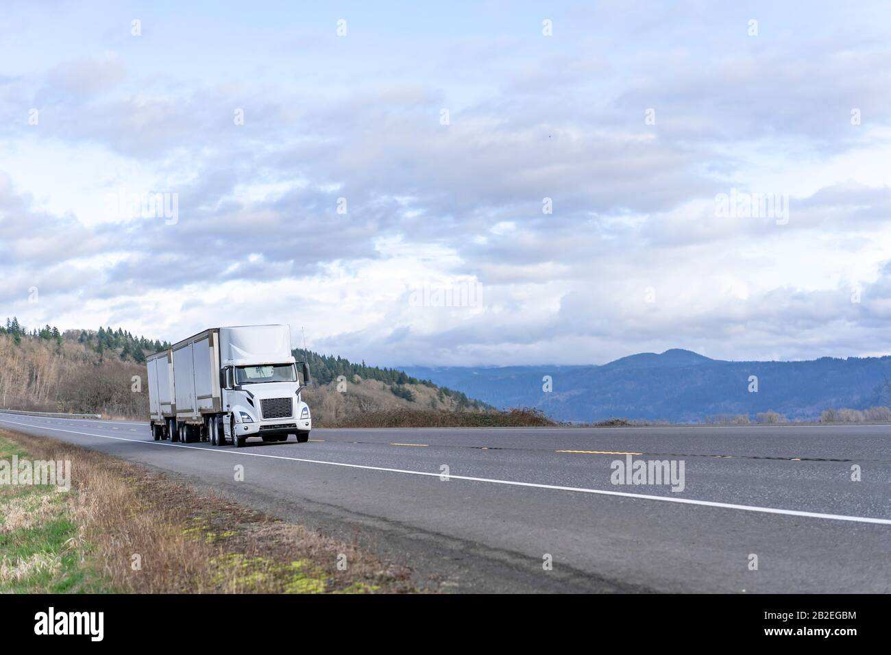 Industrial grade transportation road train white big rig long haul ...