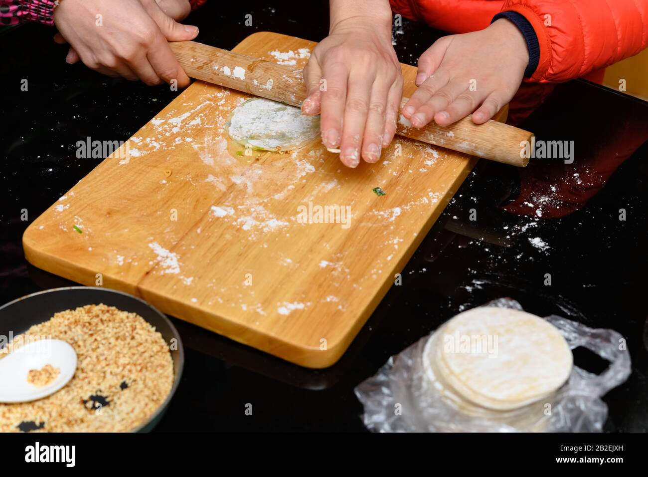 lady and kid making cakes at home Stock Photo - Alamy