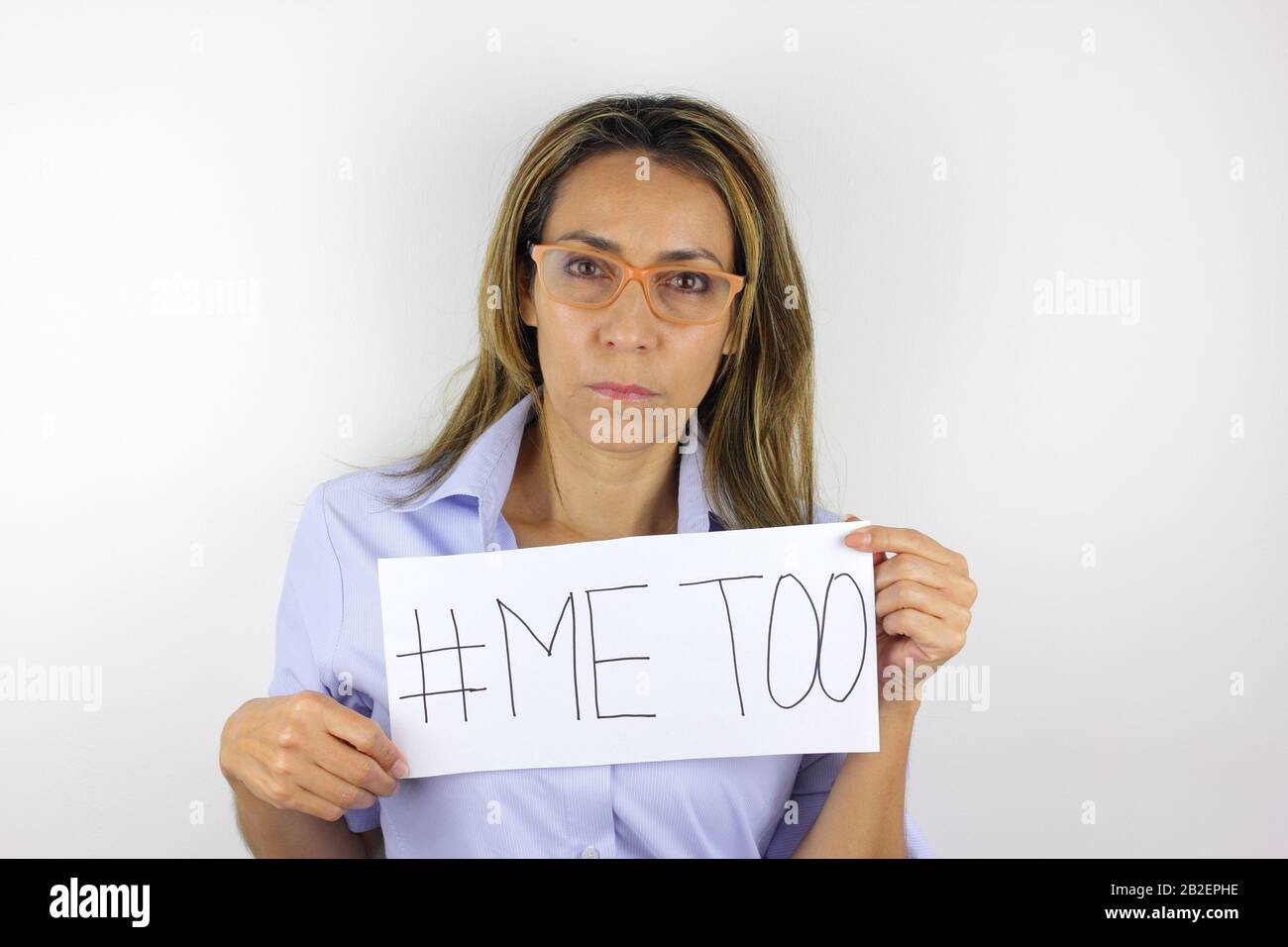 Me too social movement a Latin American business Woman holding a me too ...