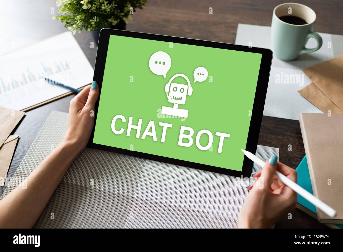 Chatbot icon on device screen. Customer Support automation concept ...
