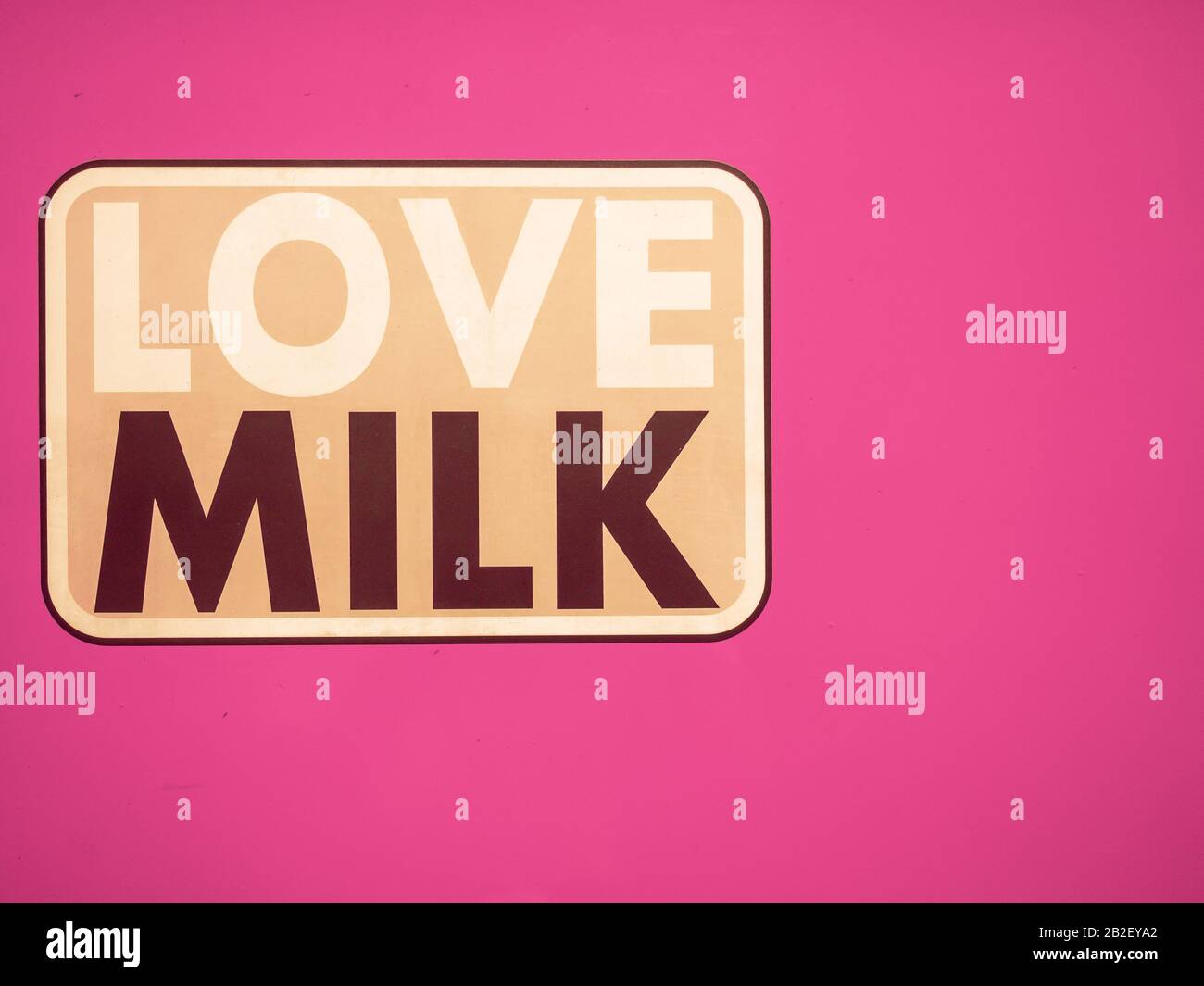 The aluminum plate in retro style pink background with copy space for ...