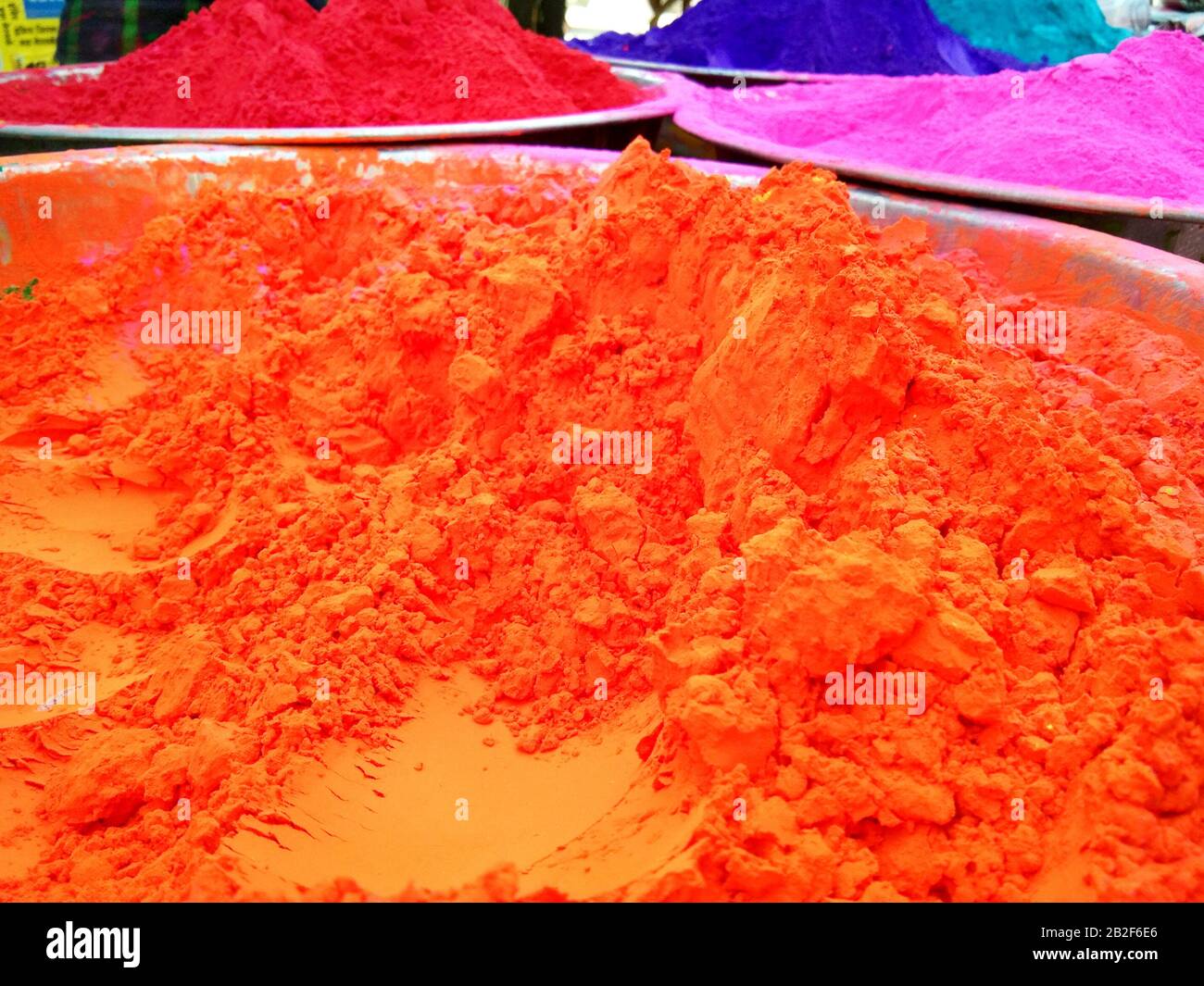 Colorful piles of powder sold on the market before Holi festival in ...
