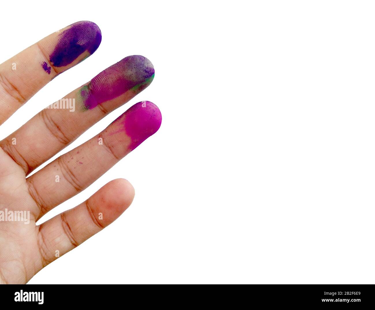 An Indian boy shows his colored fingers in white background Stock Photo ...