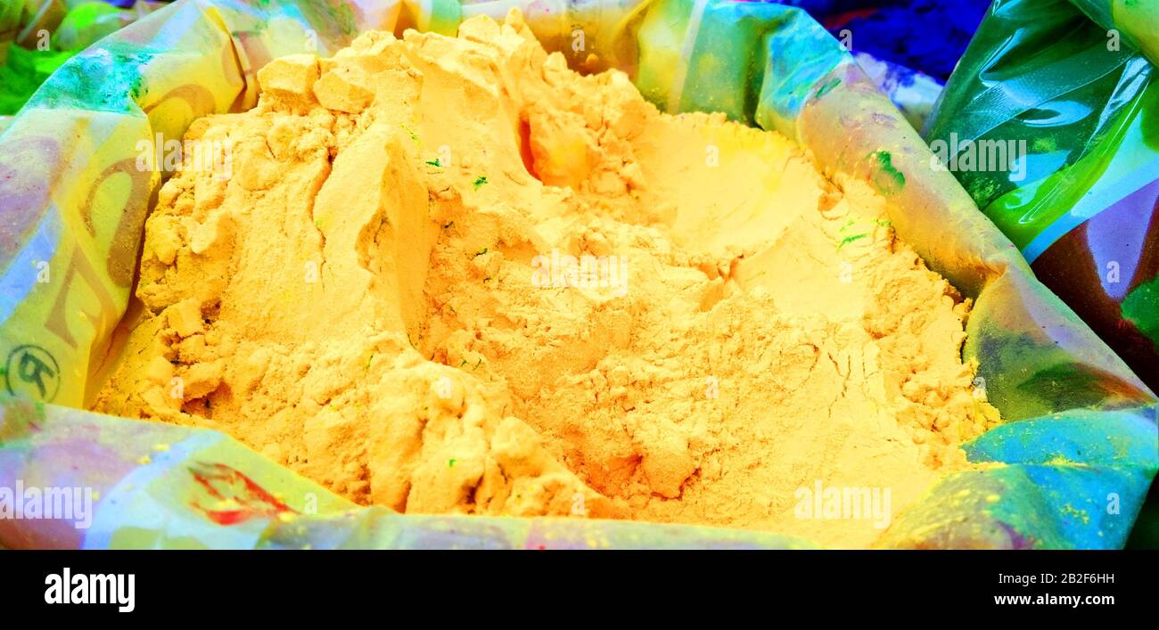 Colorful piles of powder sold on the market before Holi festival in ...