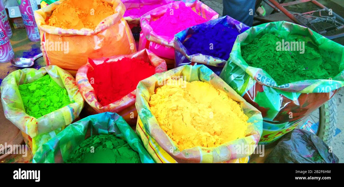 Colorful piles of powder sold on the market before Holi festival in ...