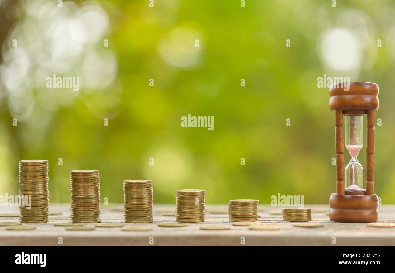 Hourglass time saving hi-res stock photography and images - Alamy