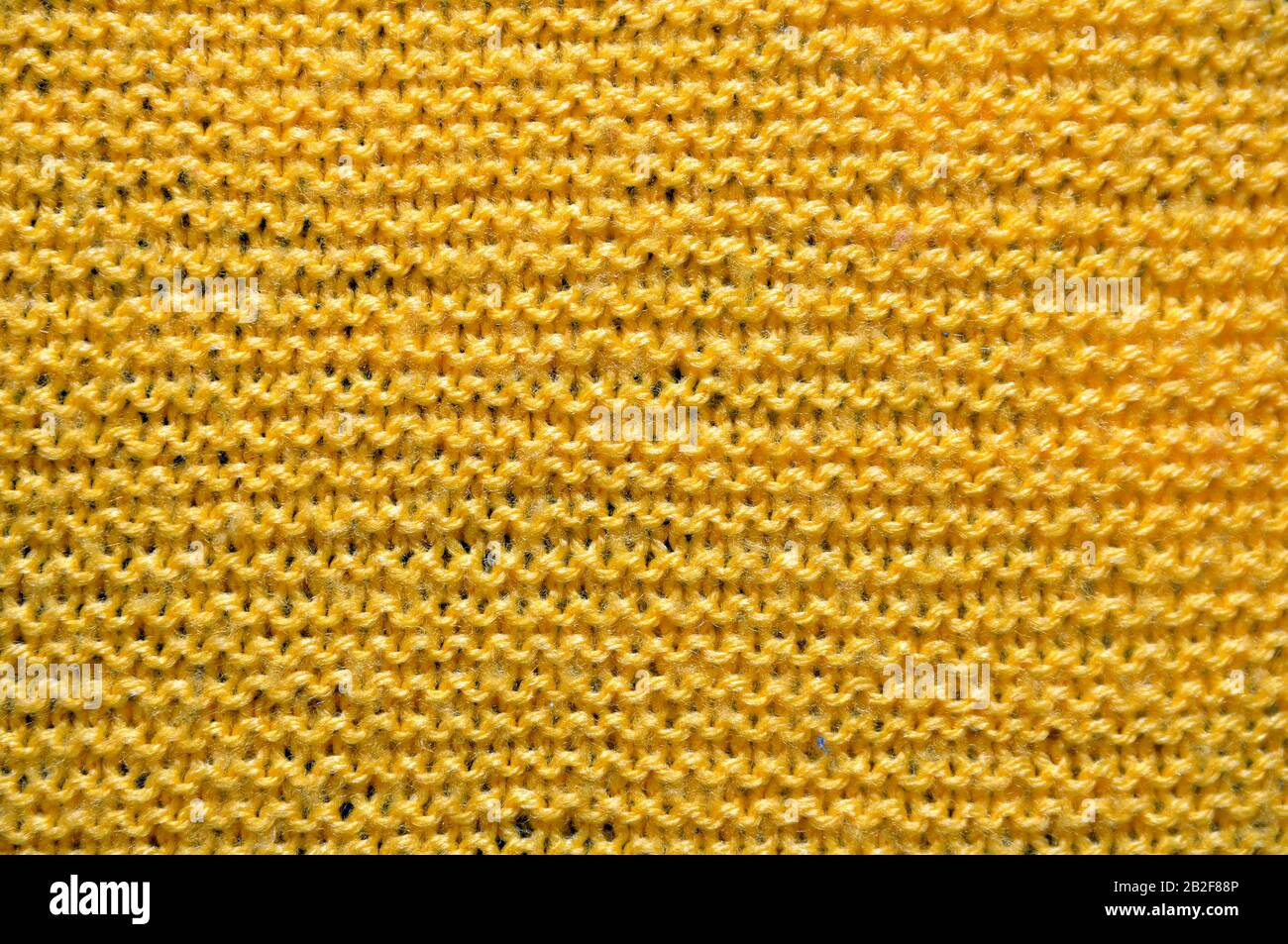 Fiber texture of woolen fabric. Yellow. Background texture Stock Photo ...