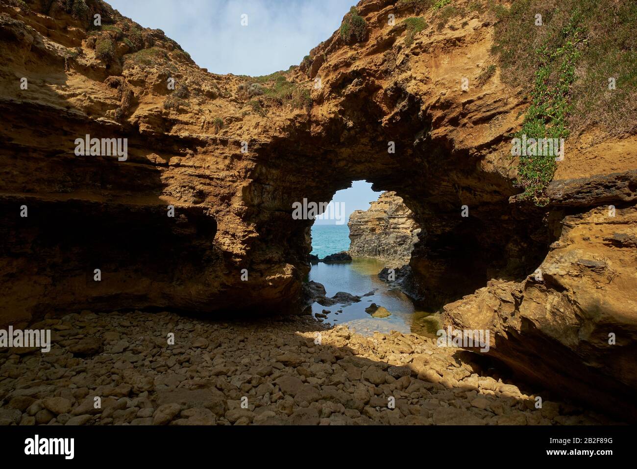 A hole at the Grotto rock formation along the Great Ocean Road ...