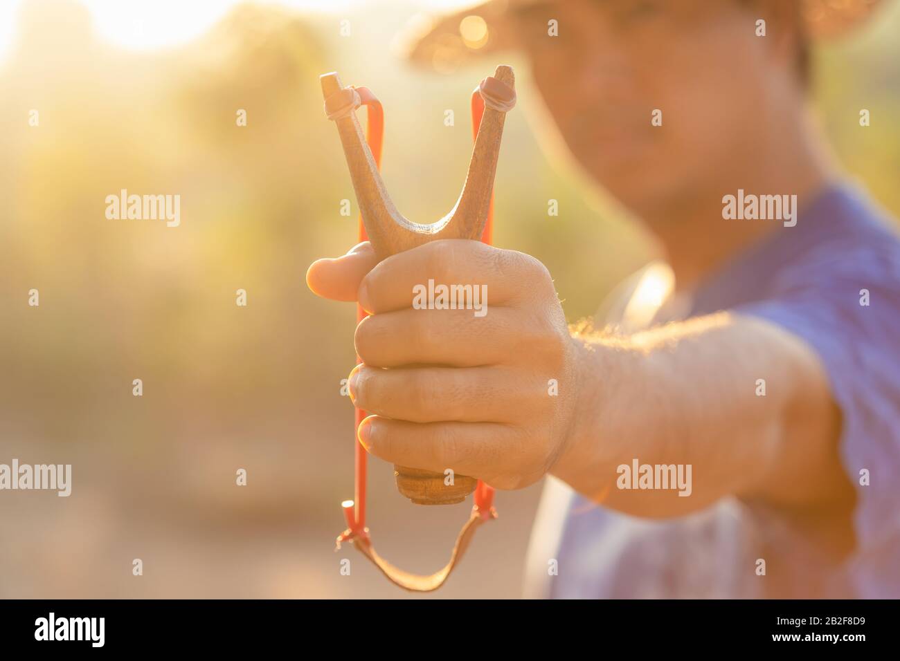 Aim boy catapult child outside hi-res stock photography and images - Alamy