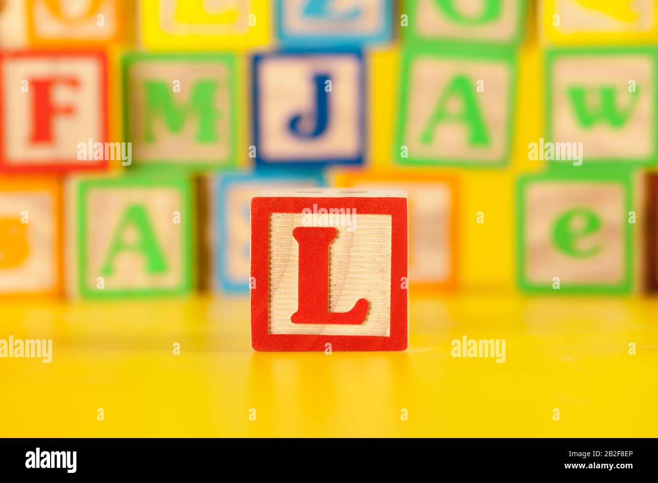 Photograph of colorful Wooden Block Letter L Stock Photo - Alamy