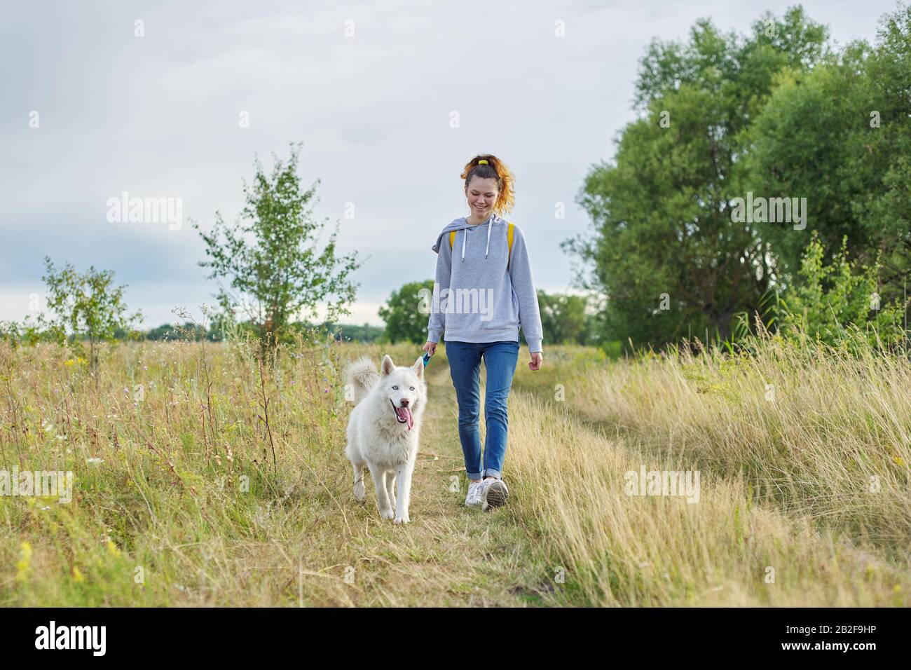 Teenager with husky hi-res stock photography and images - Alamy
