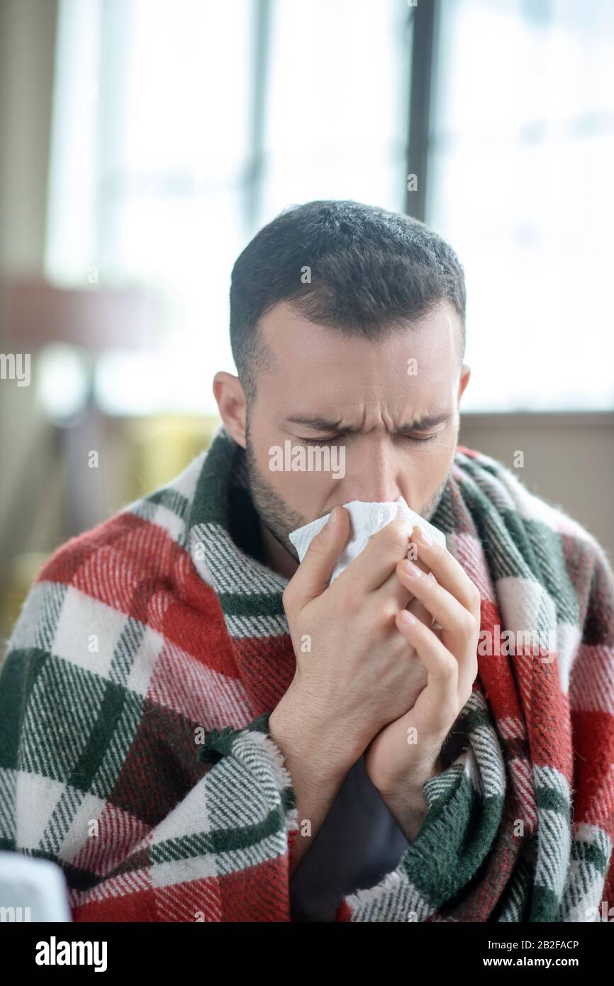 Sneezing Young Male High Resolution Stock Photography and Images - Alamy