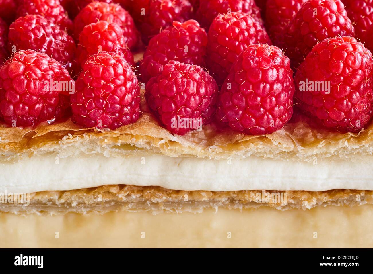 Delicious raspberry cake with puff pastry and cream. Homemade dessert ...