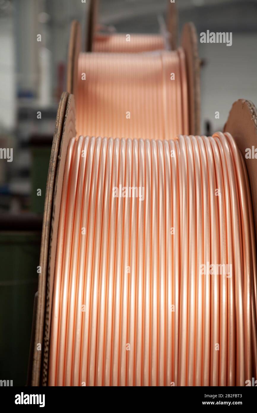 new copper pipes at the factory Stock Photo - Alamy