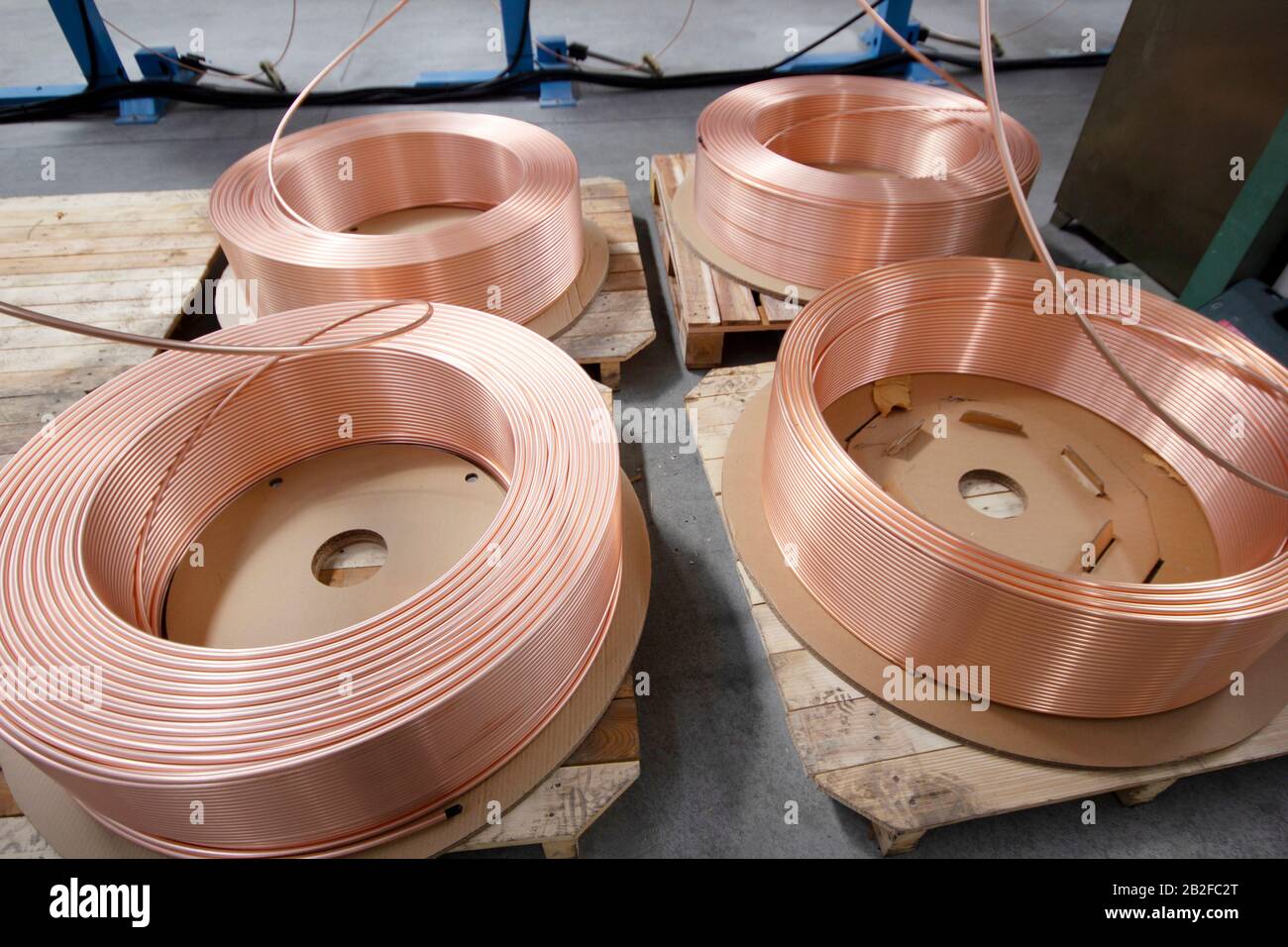 new copper pipes at the factory Stock Photo - Alamy
