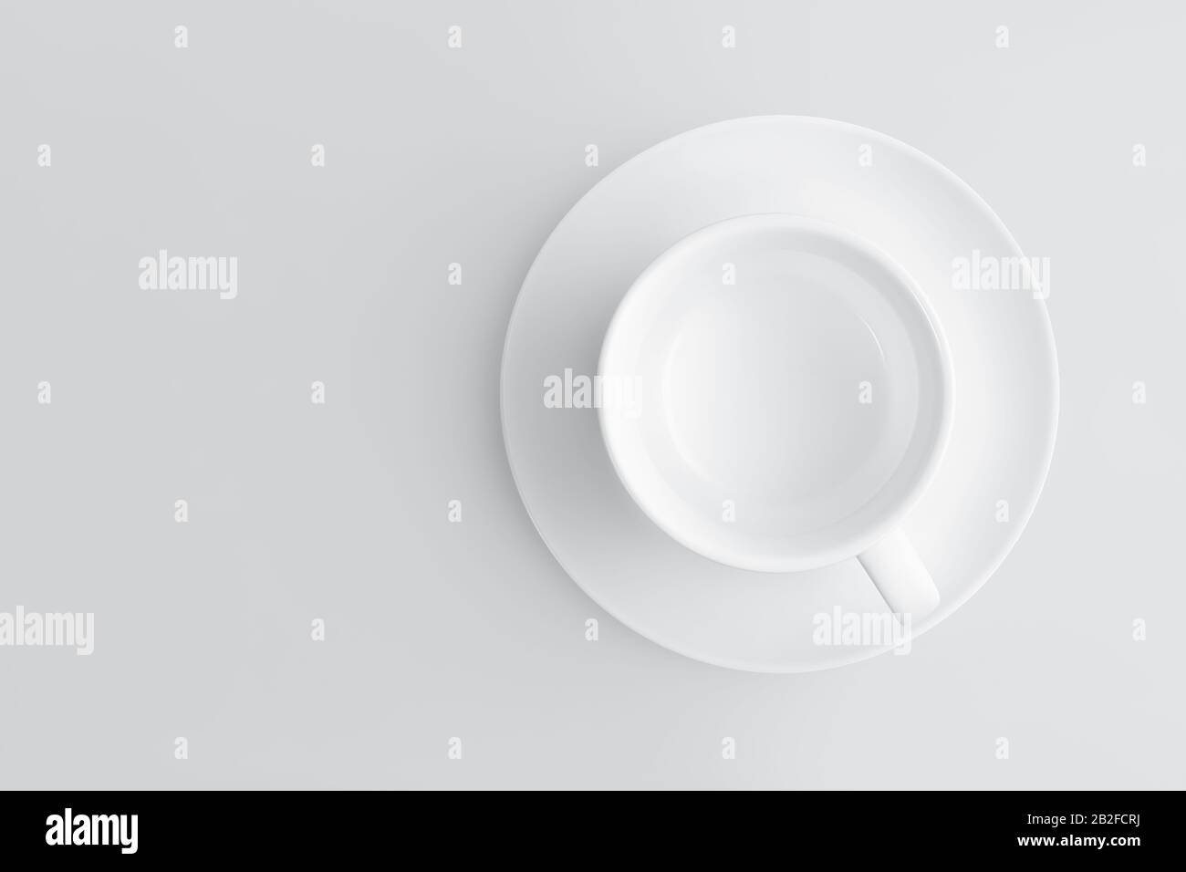 Top view of an empty coffee cup on a saucer on a gray background with ...