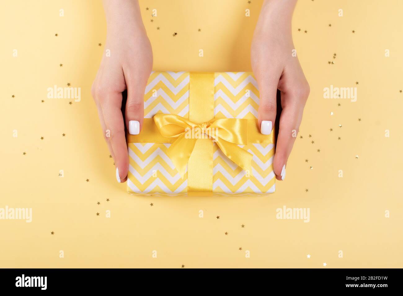 Female hands holding handmade hi-res stock photography and images - Alamy
