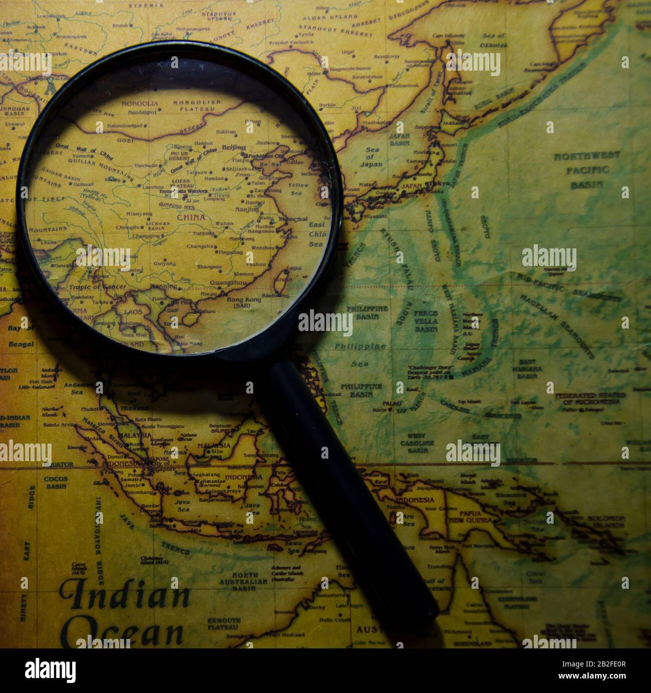 Magnifying glass on China map Stock Photo - Alamy