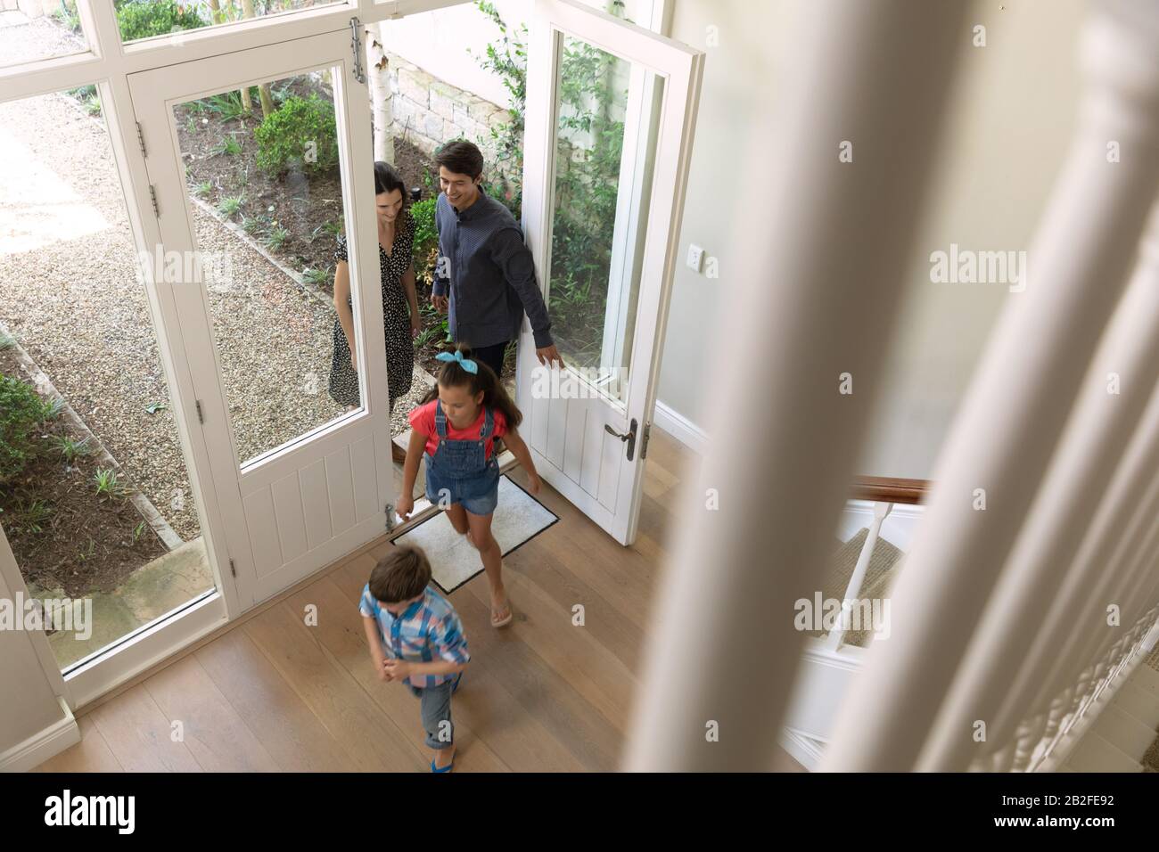 Man seen entering a house hi-res stock photography and images - Alamy