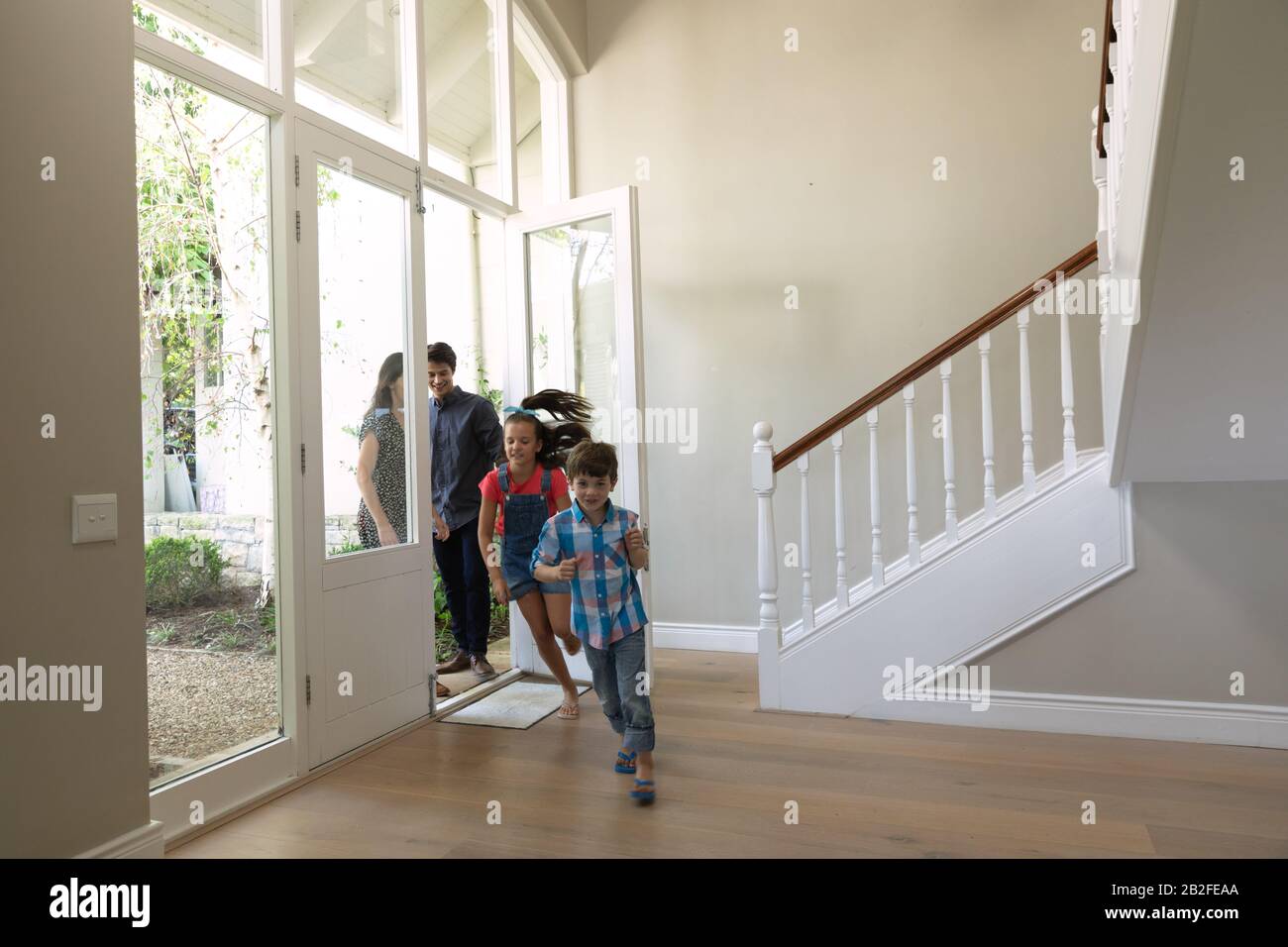 Man Daughter Entering House High Resolution Stock Photography and ...