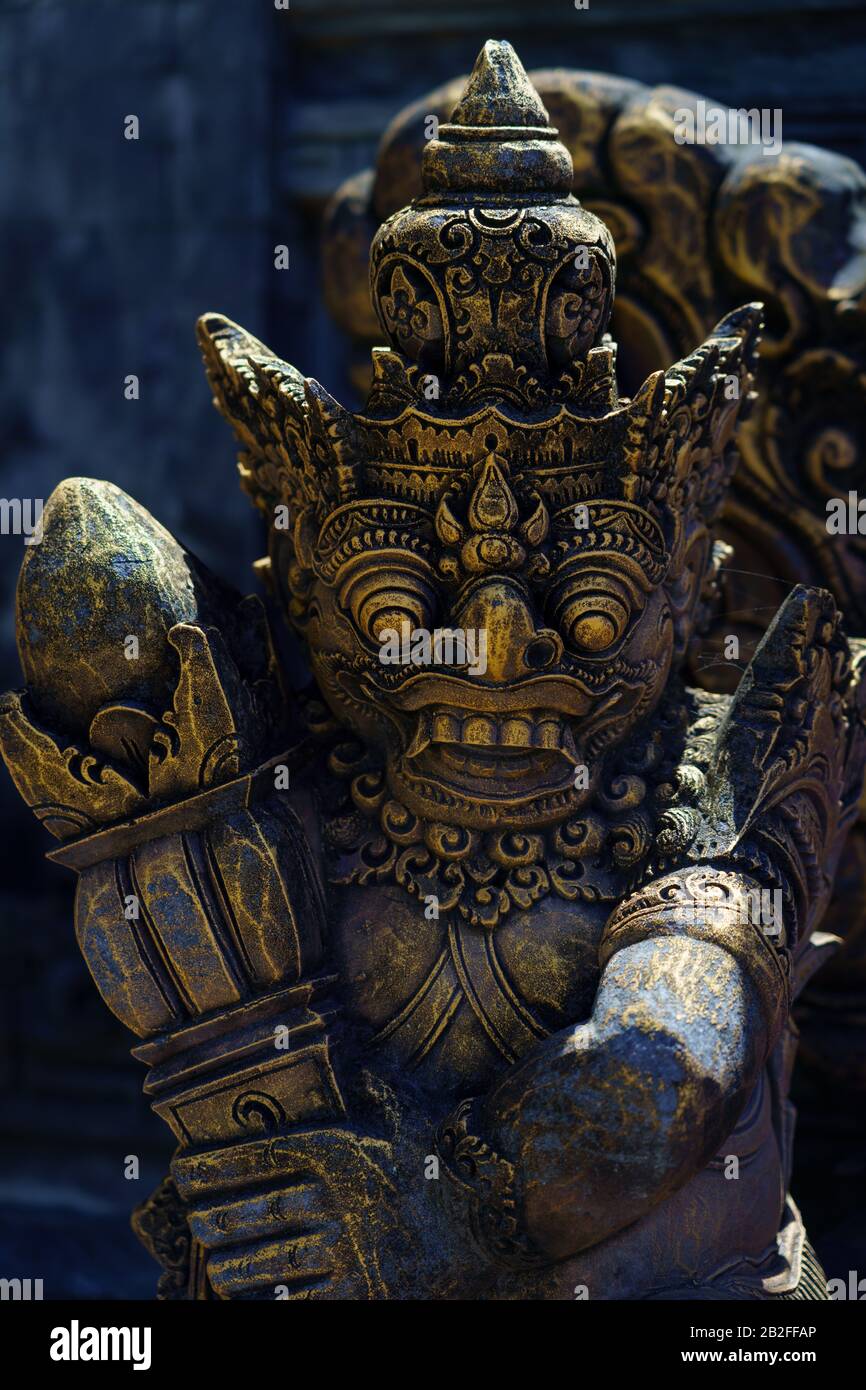 Ancient Balinese statue at the temple in Bali Indonesia Stock Photo - Alamy