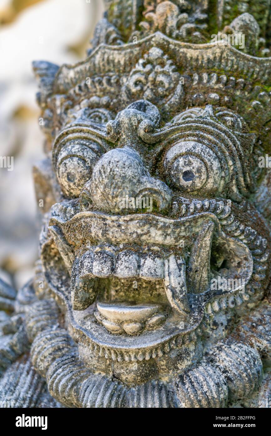 Ancient Balinese statue at the temple in Bali Indonesia Stock Photo - Alamy