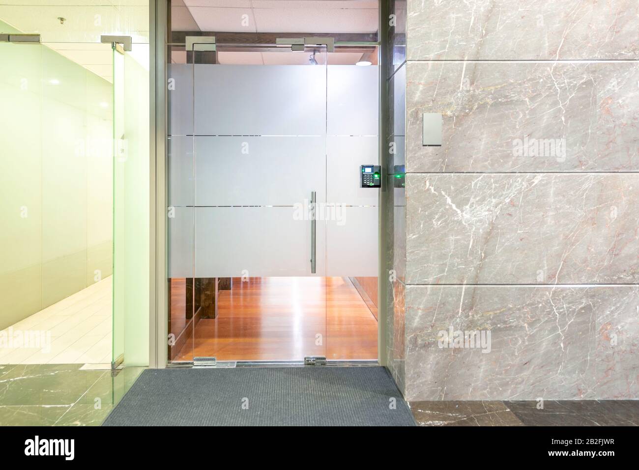 Glassdoor on the office room in the office building Stock Photo - Alamy