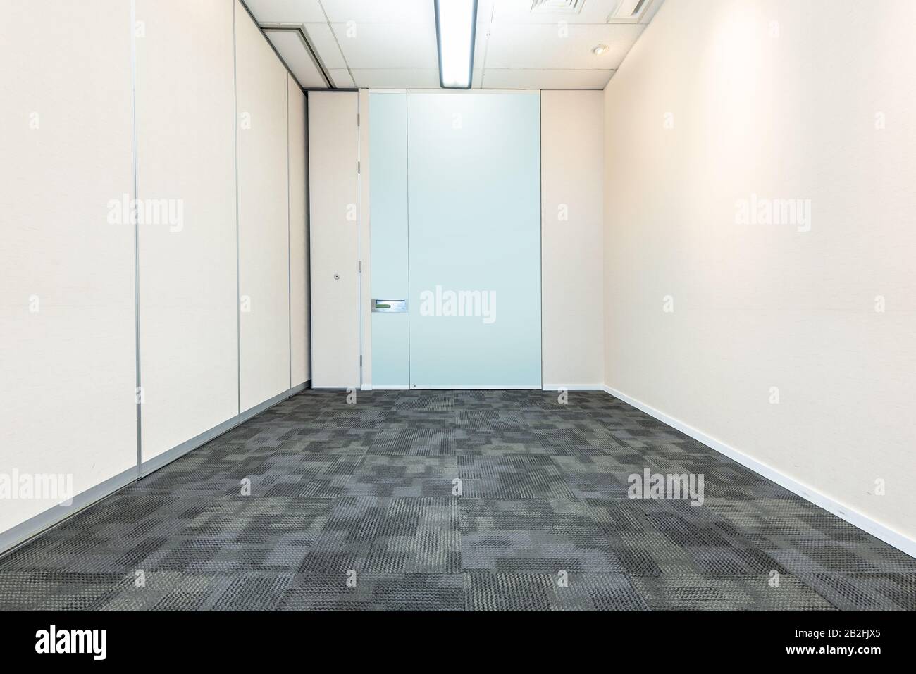 Meeting room with a board on the wall in the office building Stock ...