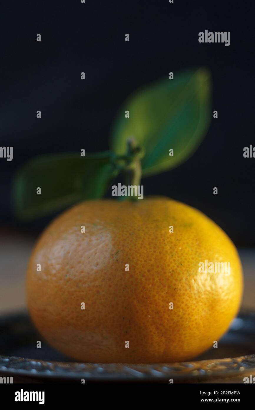 Tangerin and orange with leaf hi-res stock photography and images - Alamy