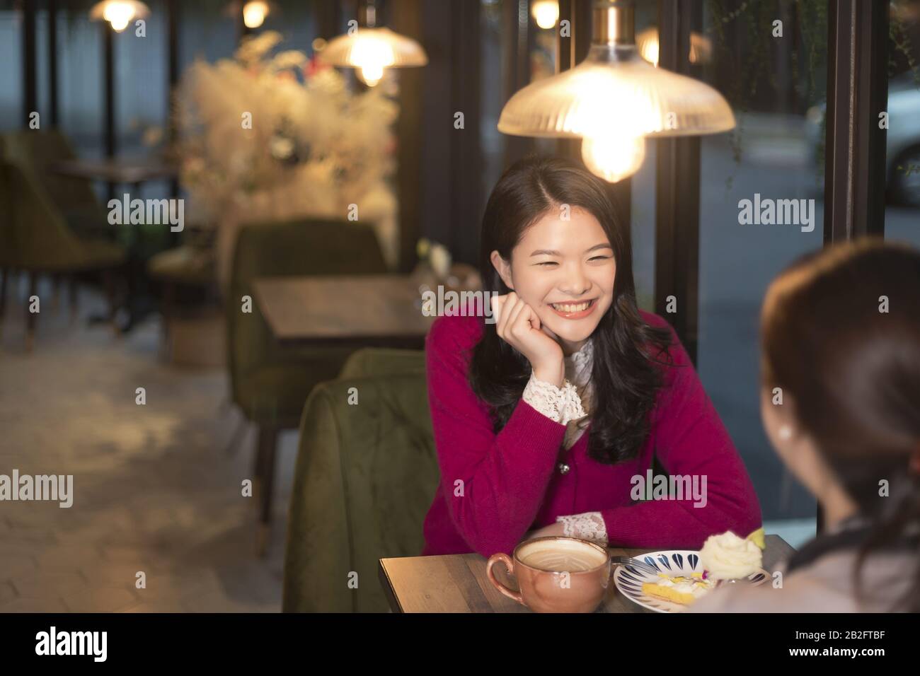 Two women having tea Stock Photo - Alamy