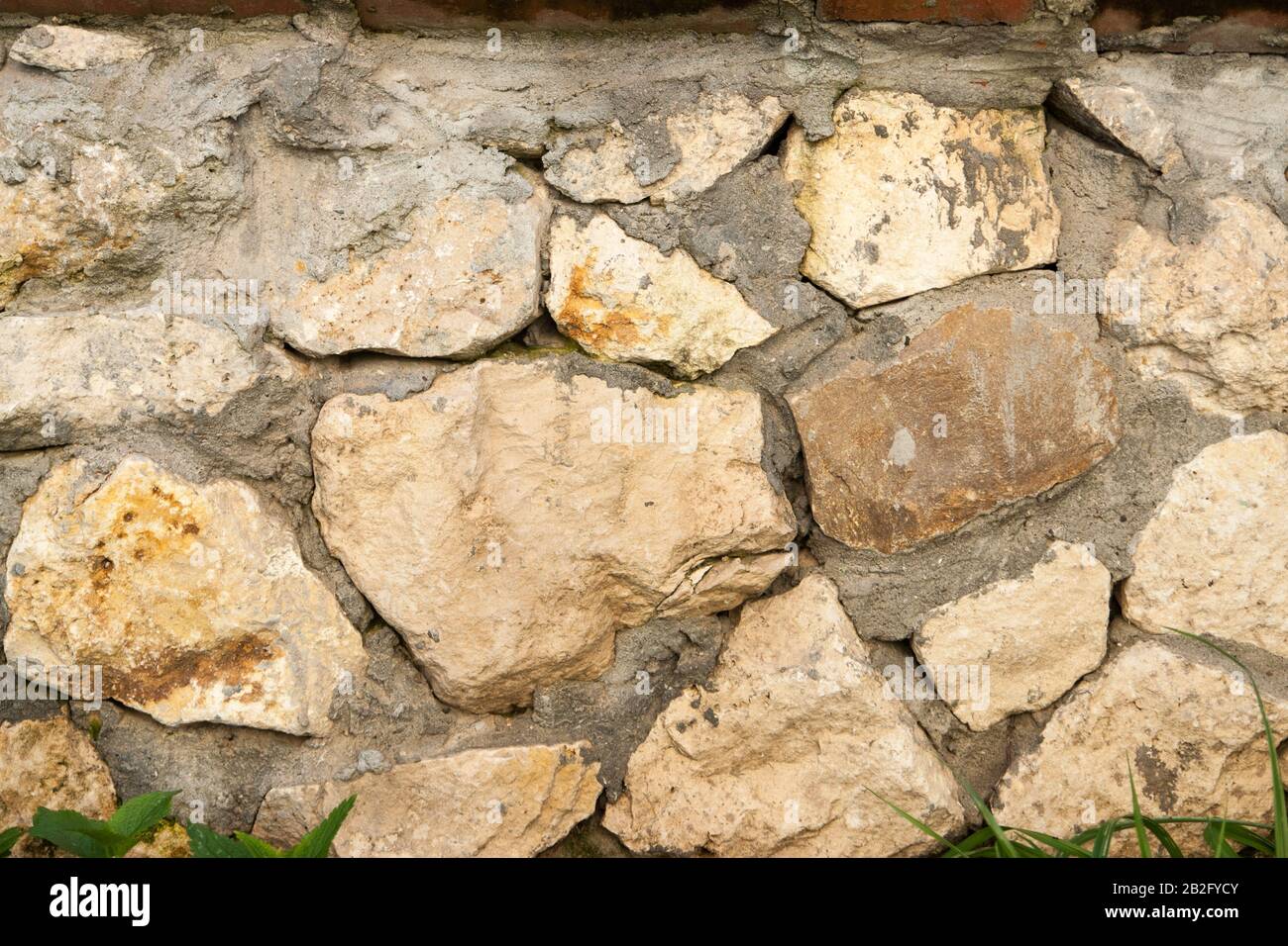stones wall texture. Rock wall backgrond outdoors Stock Photo - Alamy