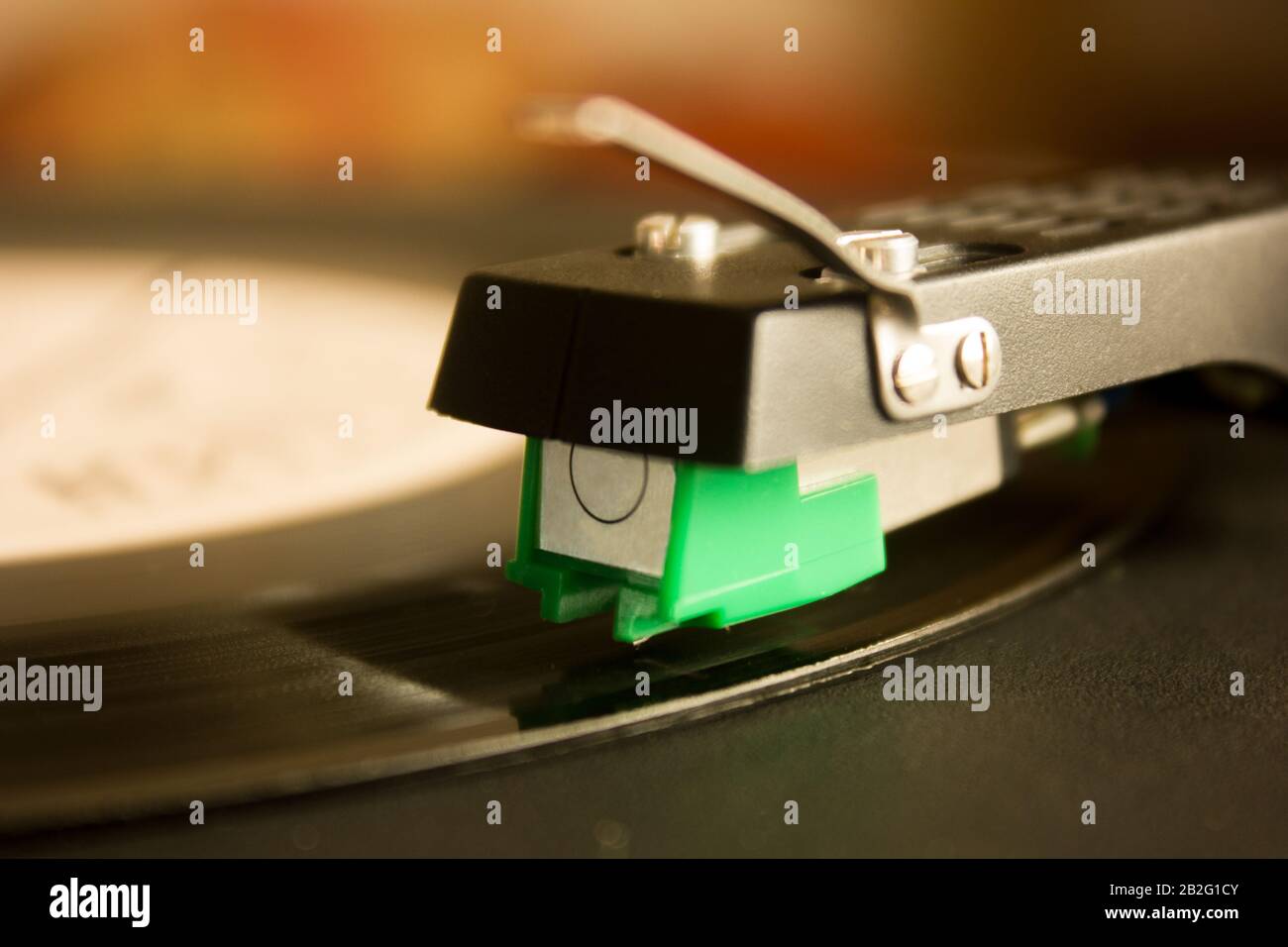 Turntable playing vinyl close up with needle on the record Stock Photo ...
