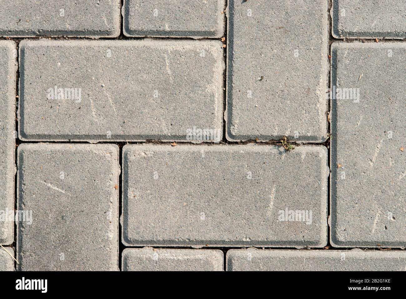 Grey brick stone street road. pavement texture Stock Photo - Alamy