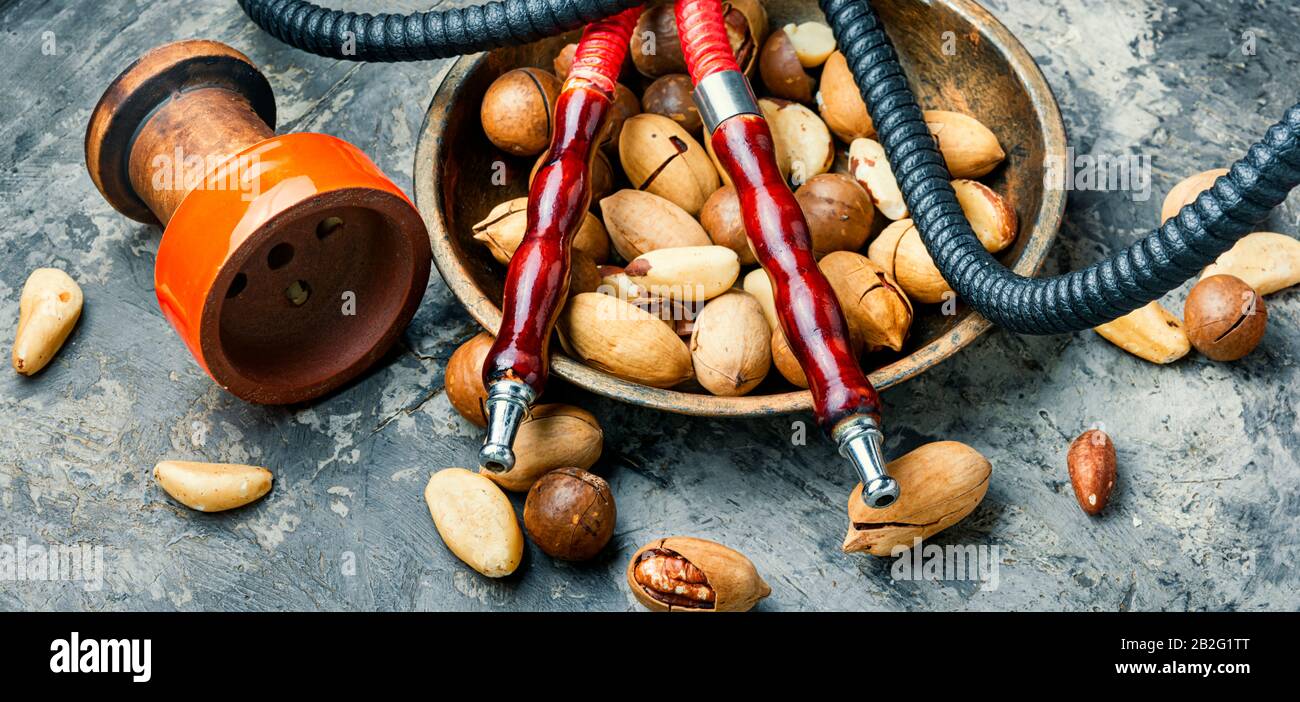 Tobacco smoking hookah with the aroma of nuts.Nuts shisha tobacco Stock ...