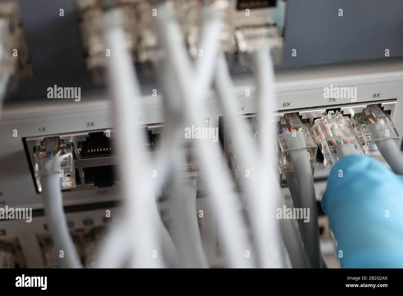Network cables connected to switches Stock Photo - Alamy