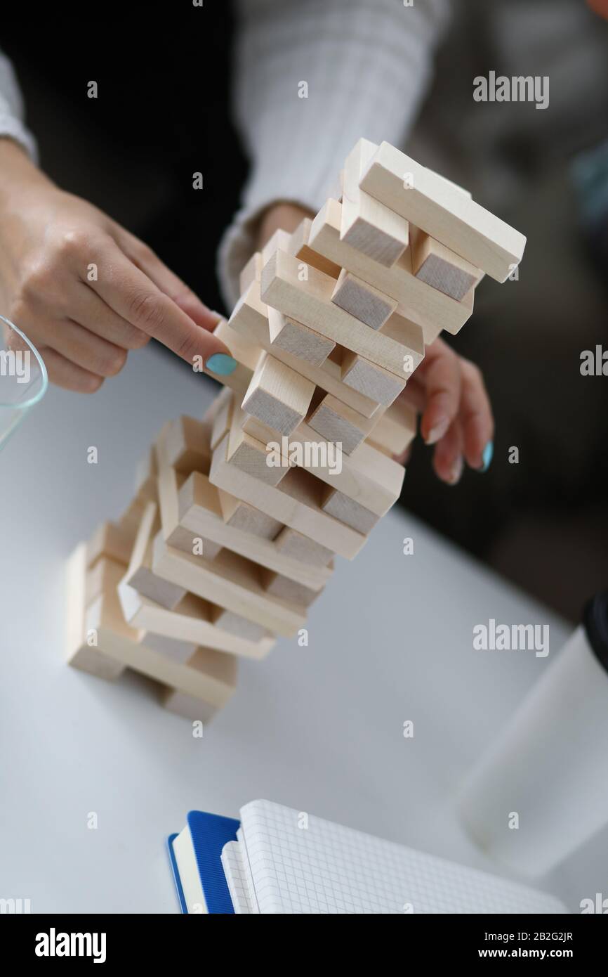 Woman jenga hi-res stock photography and images - Alamy