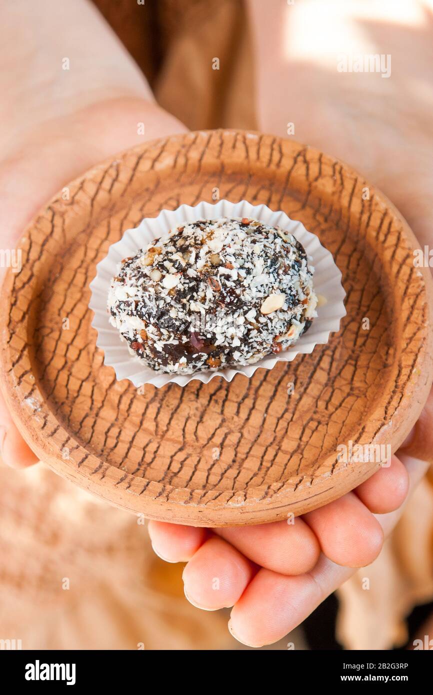 Homemade candy with prune, peanut and coconut flakes Stock Photo - Alamy